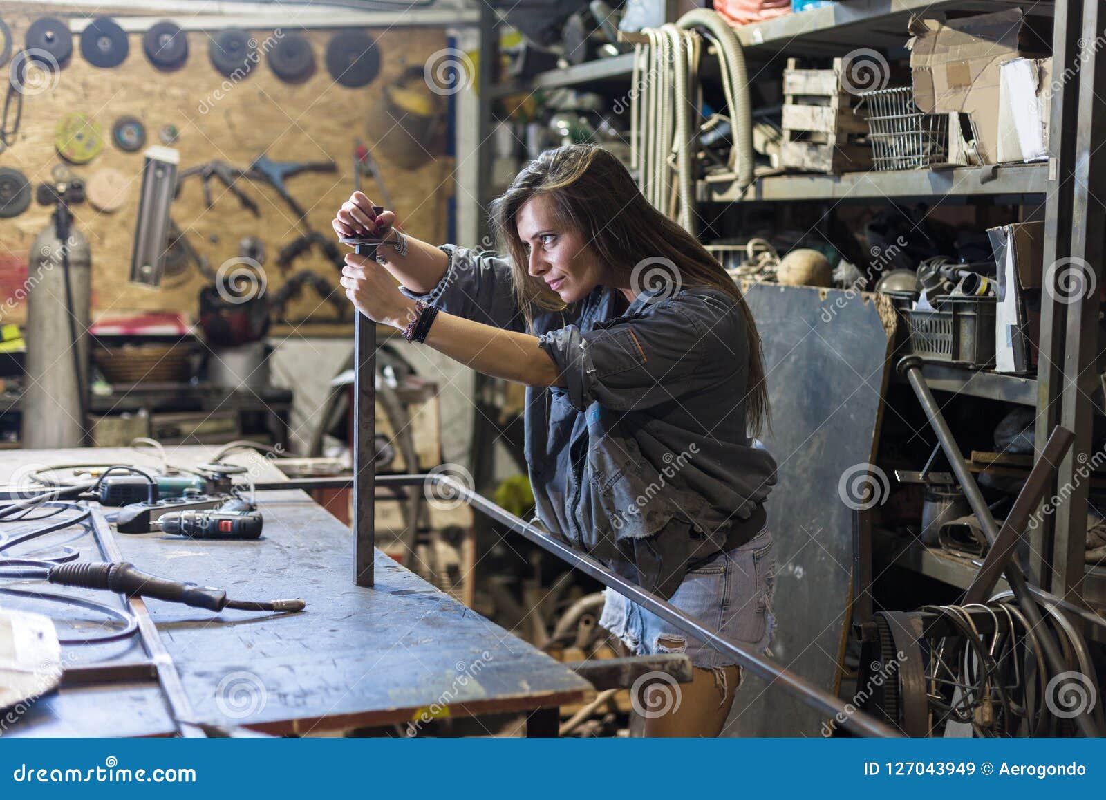Young Woman Worker in Workshop Stock Image - Image of profession, metal ...
