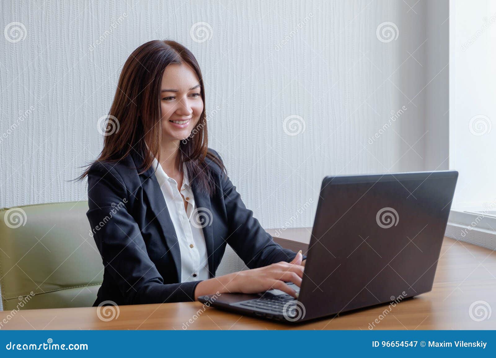 Young Woman Working Behind Laptop at Office Stock Image - Image of ...