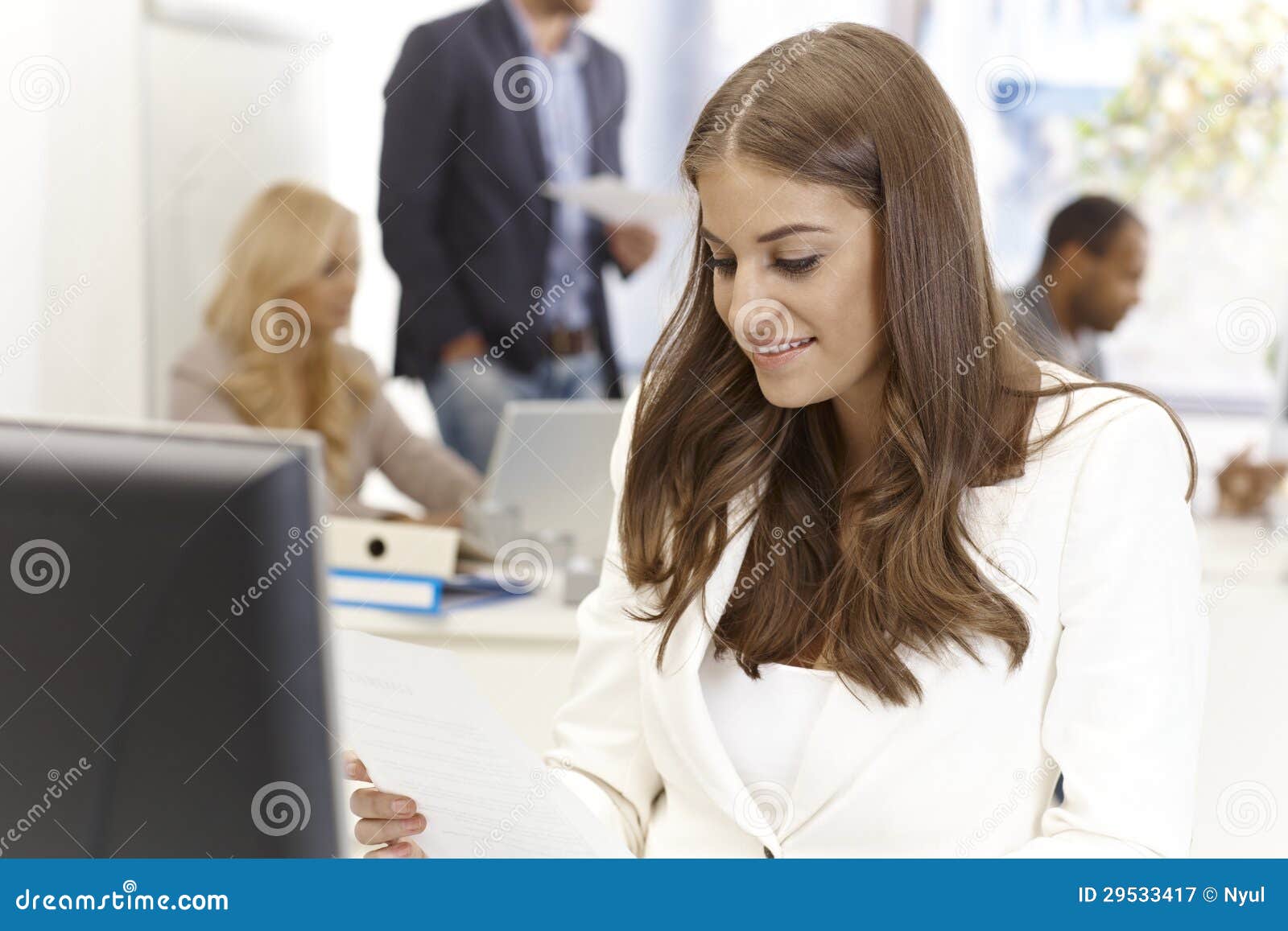 Young Woman Working in Busy Office Stock Image - Image of ...