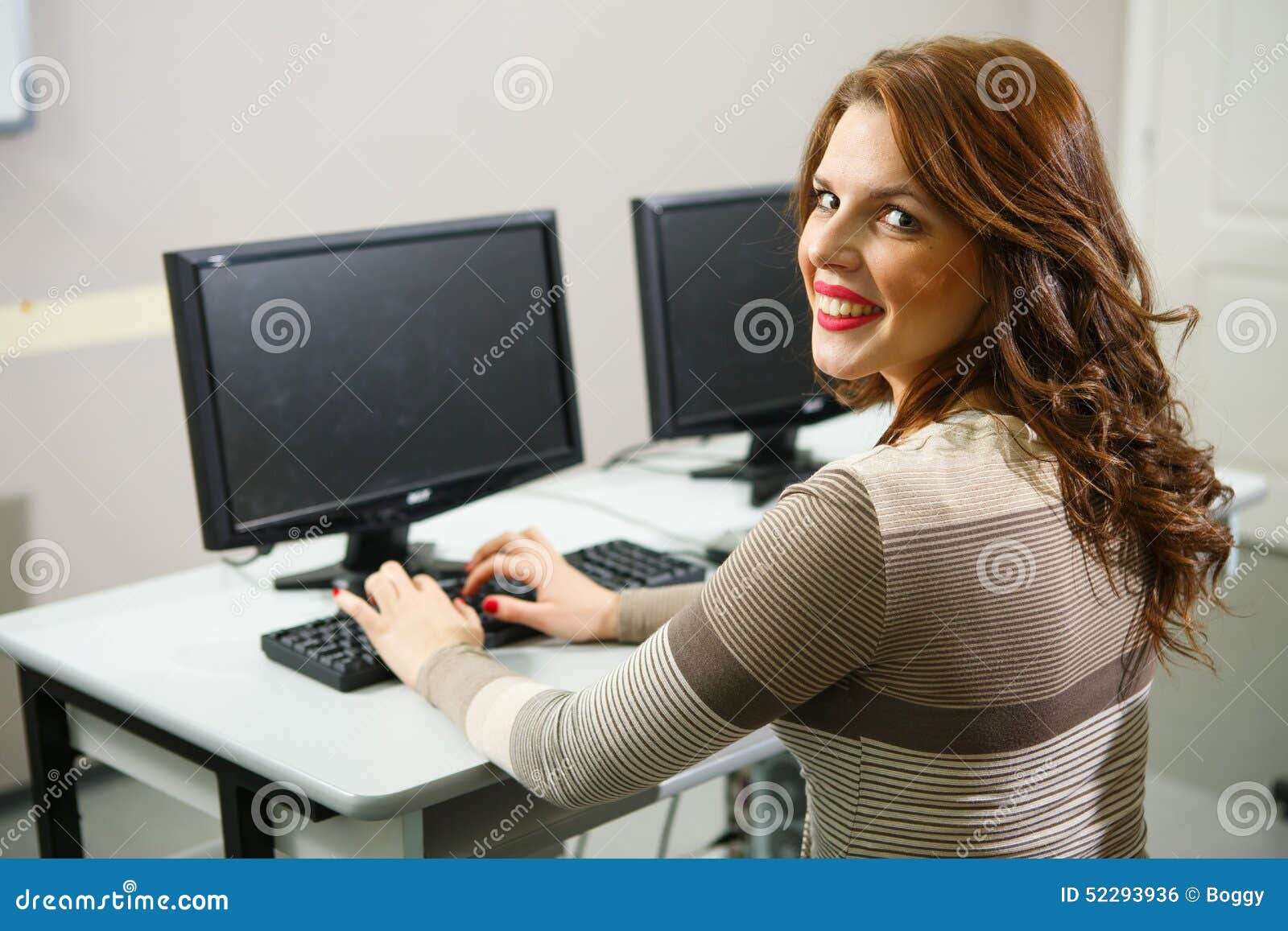 Young Woman Working on the Computer Stock Photo - Image of looking ...