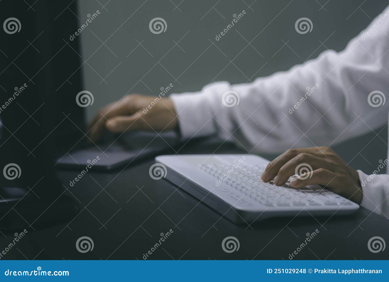 Young Woman Working in Front of the Computer on the Desk Stock Photo ...