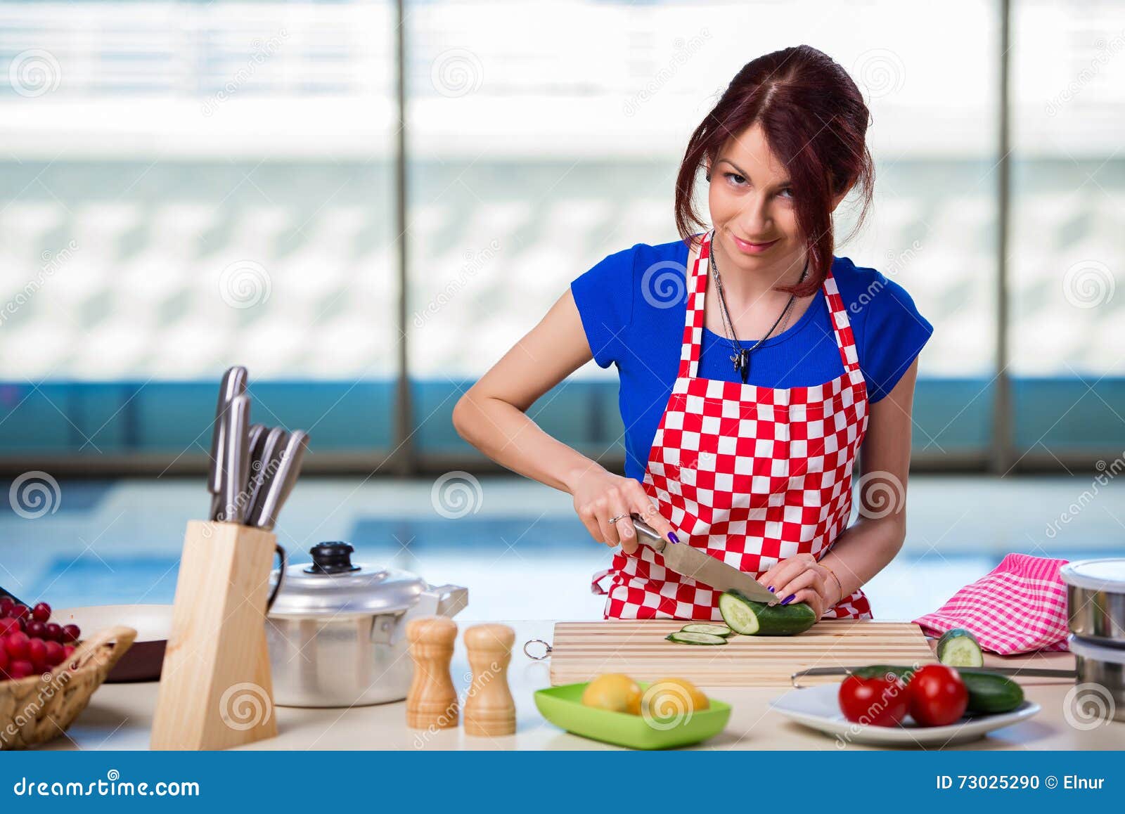 The Young Woman Working in the Kitchen Stock Photo - Image of ...