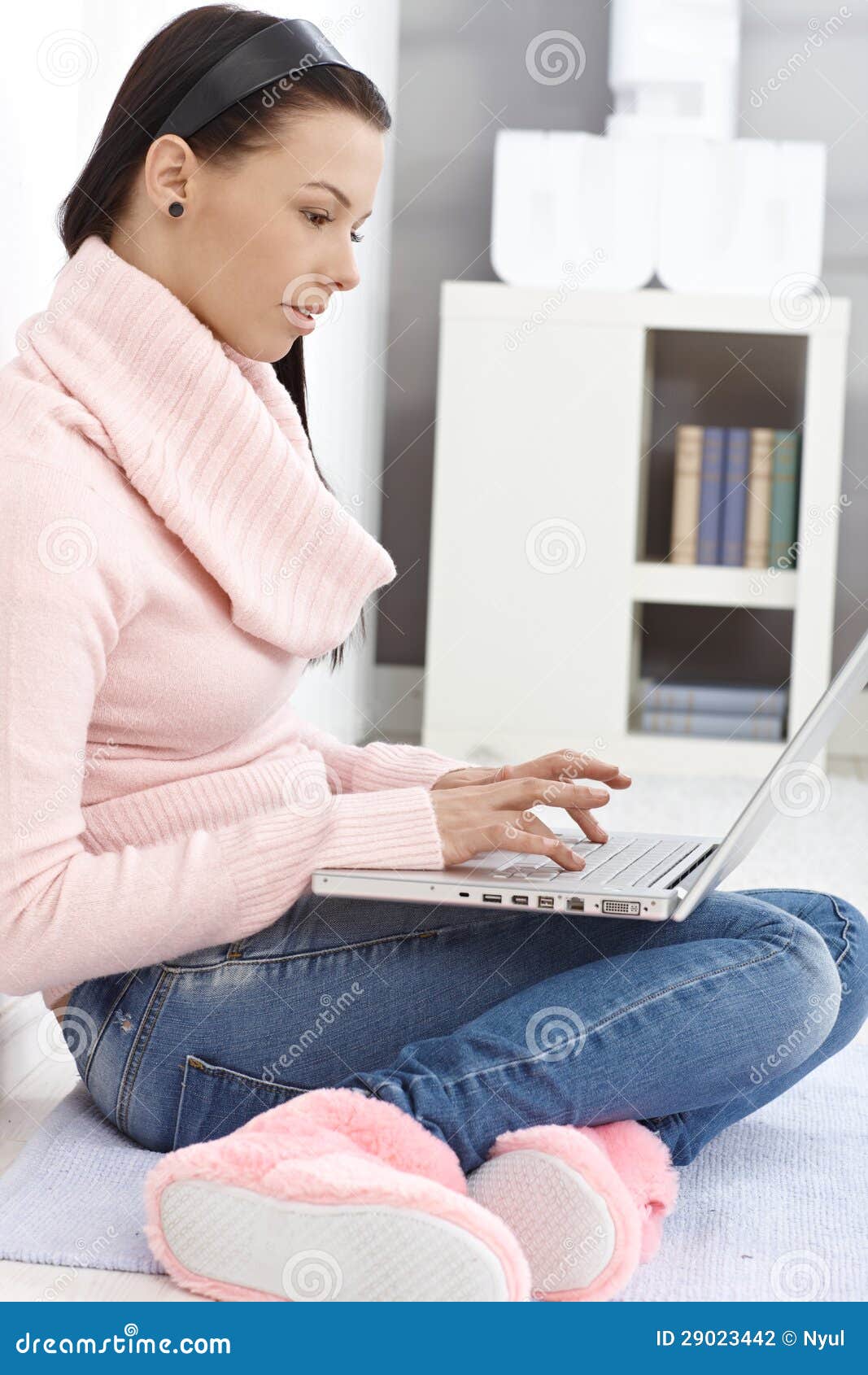 Young Woman Working on Laptop at Home Stock Photo - Image of fulllength ...