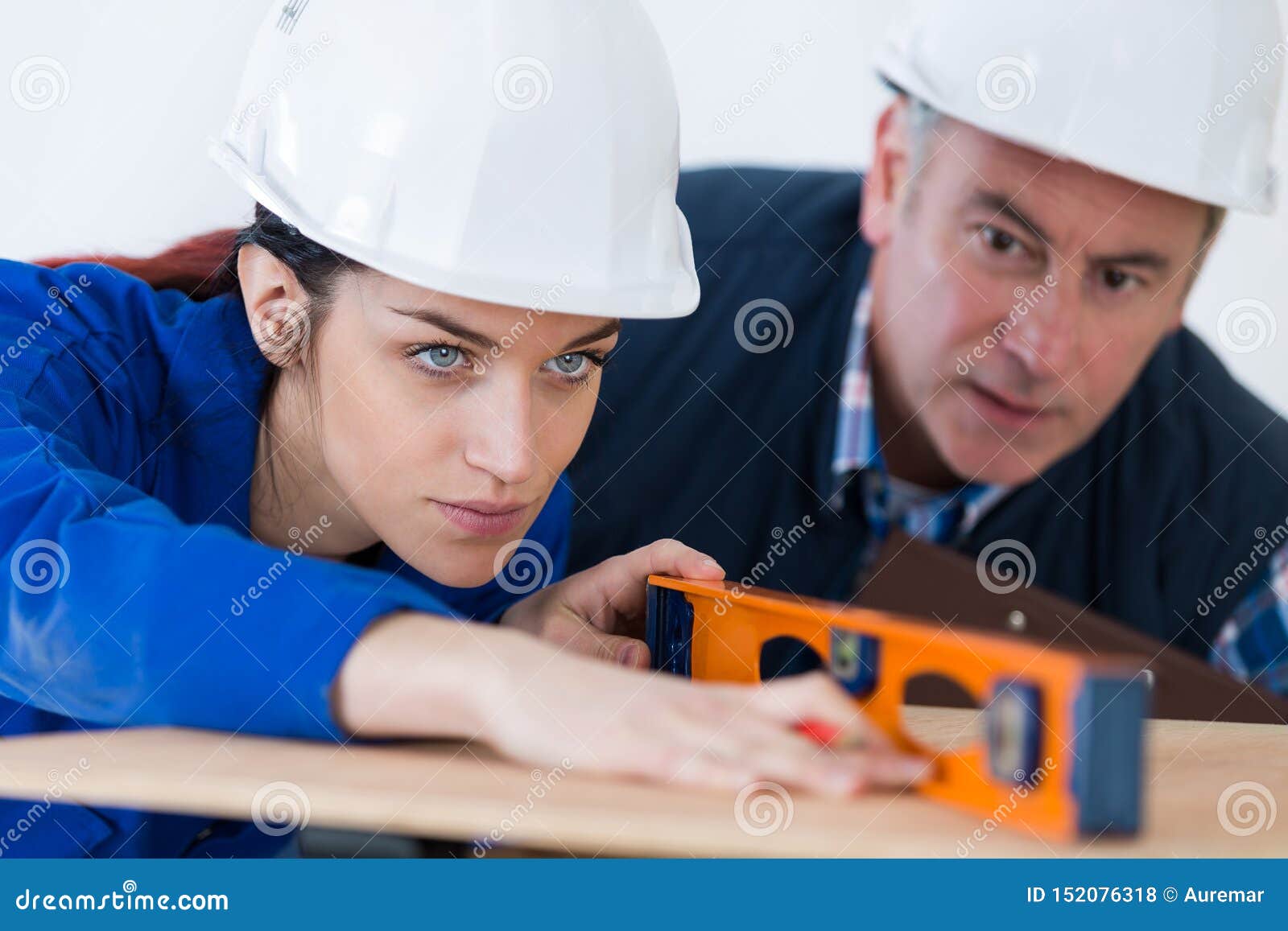 Young Woman Working with Level Stock Photo - Image of apprenticeship ...