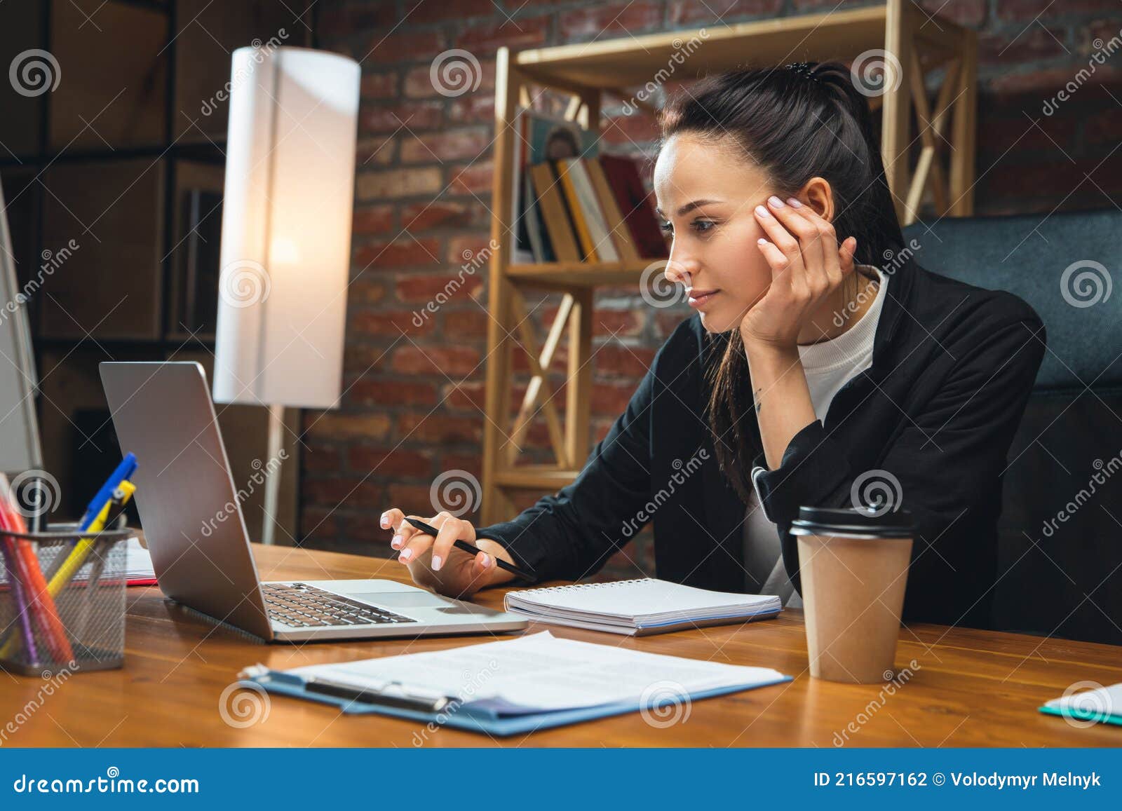 Young Woman Working in Modern Office Using Devices and Gadgets. Making ...