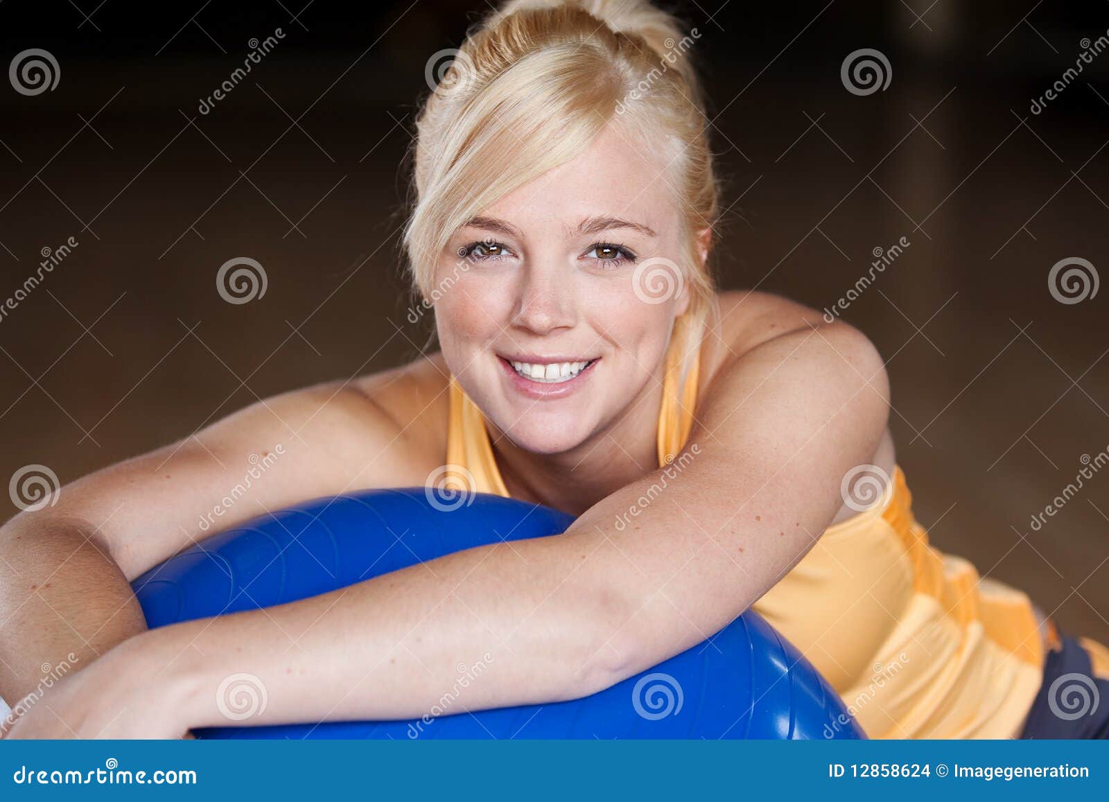 Young Woman Working Out with Exercise Ball Stock Photo - Image of ...