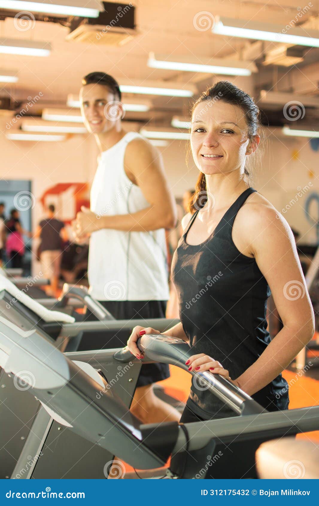 Young Woman Working Out in a Treadmill at the Gym Stock Photo - Image ...