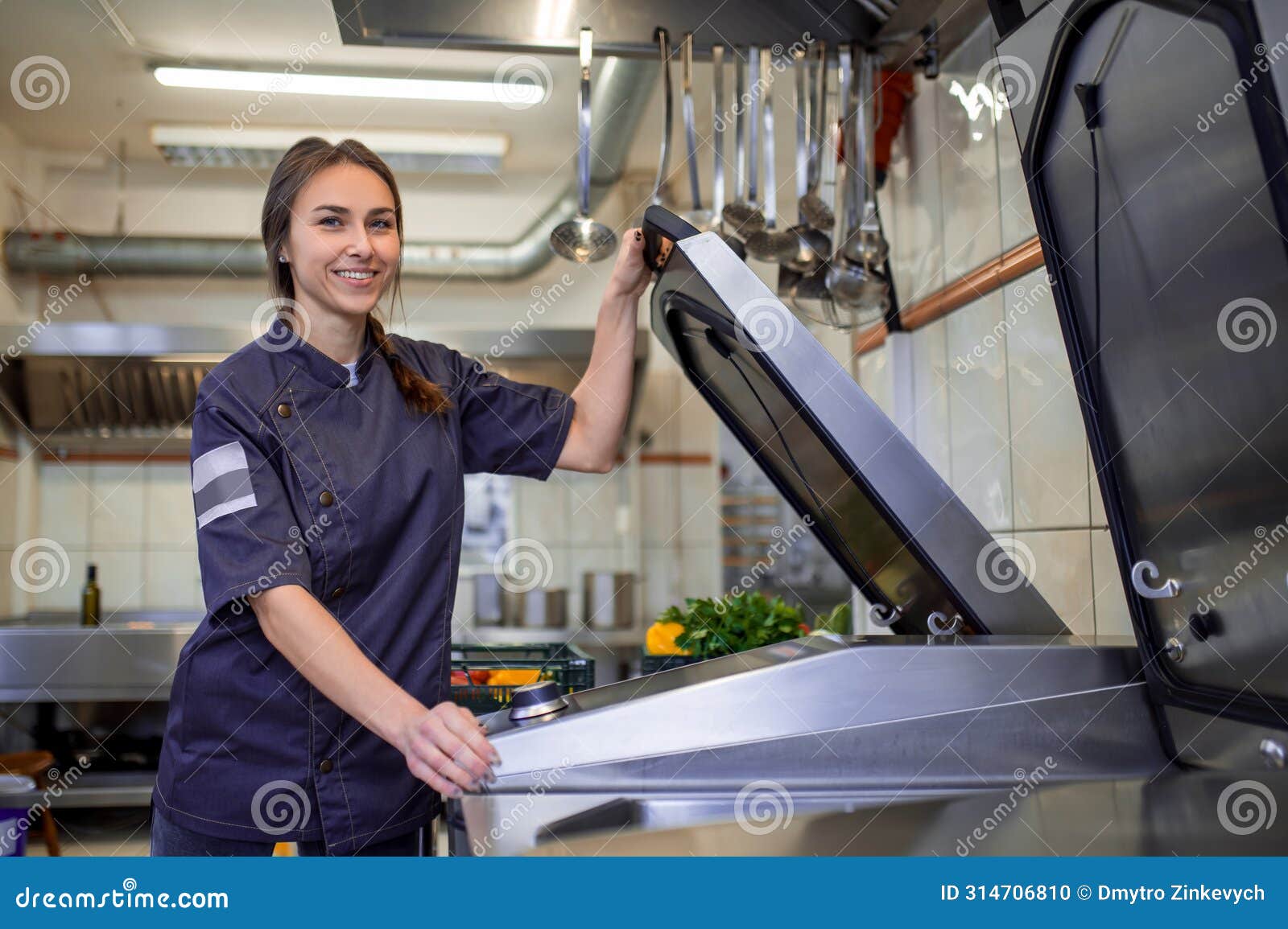 Young Woman Working in a Restaurant Kitchen Stock Photo - Image of ...