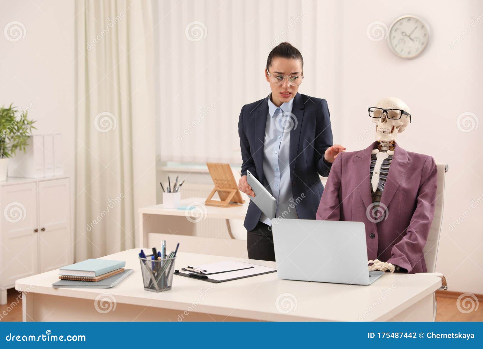 Young Woman Working with Skeleton in Office Stock Photo - Image of ...