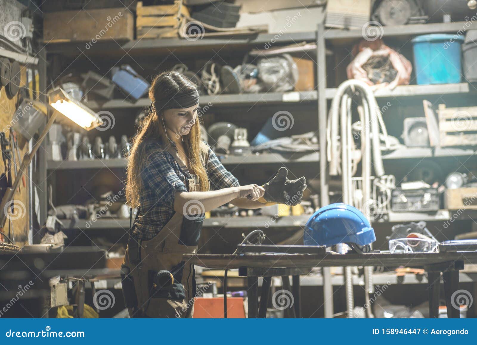 Young Woman Working in a Workshop Stock Image - Image of girl, garage ...
