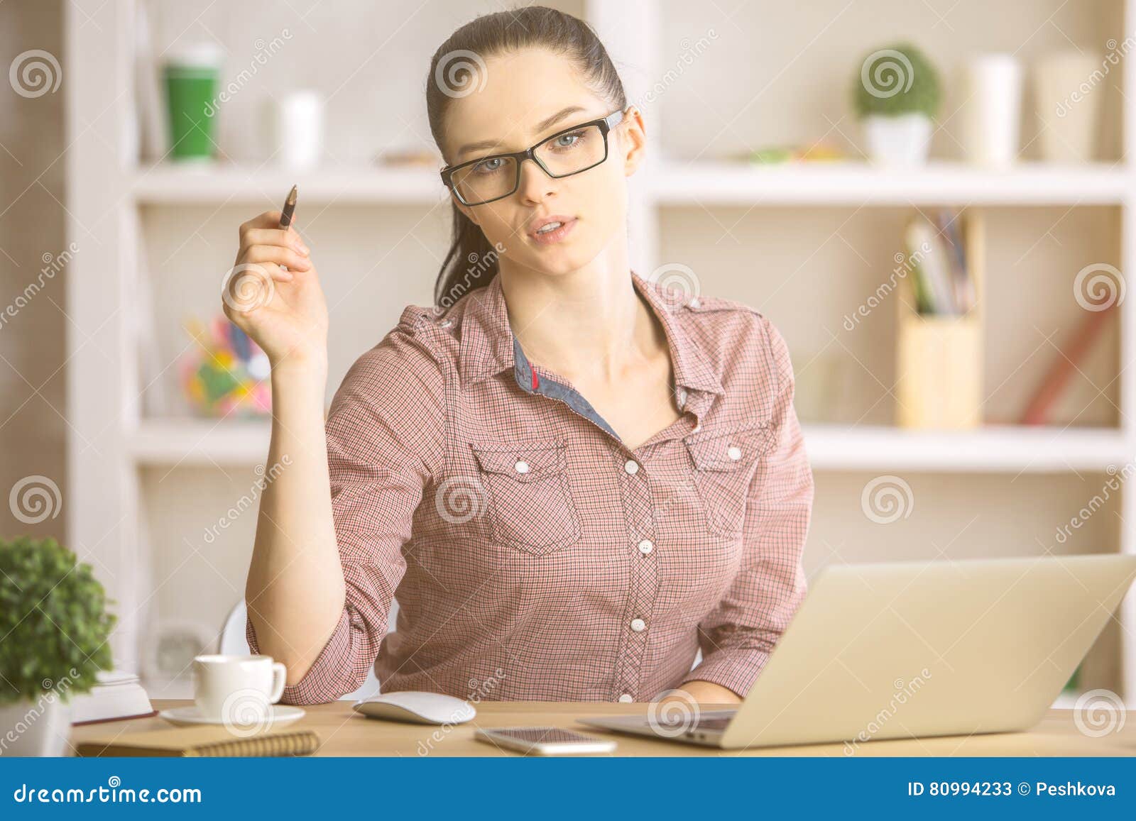 Young woman at workplace stock image. Image of brunette - 80994233