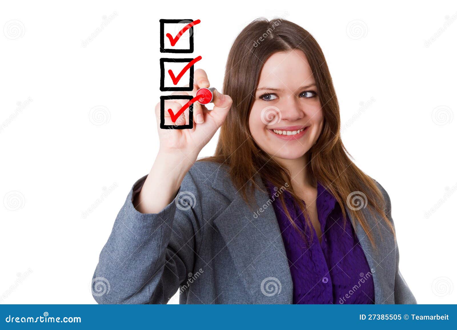 Young Woman Writing a Check Mark Stock Image - Image of check, person ...