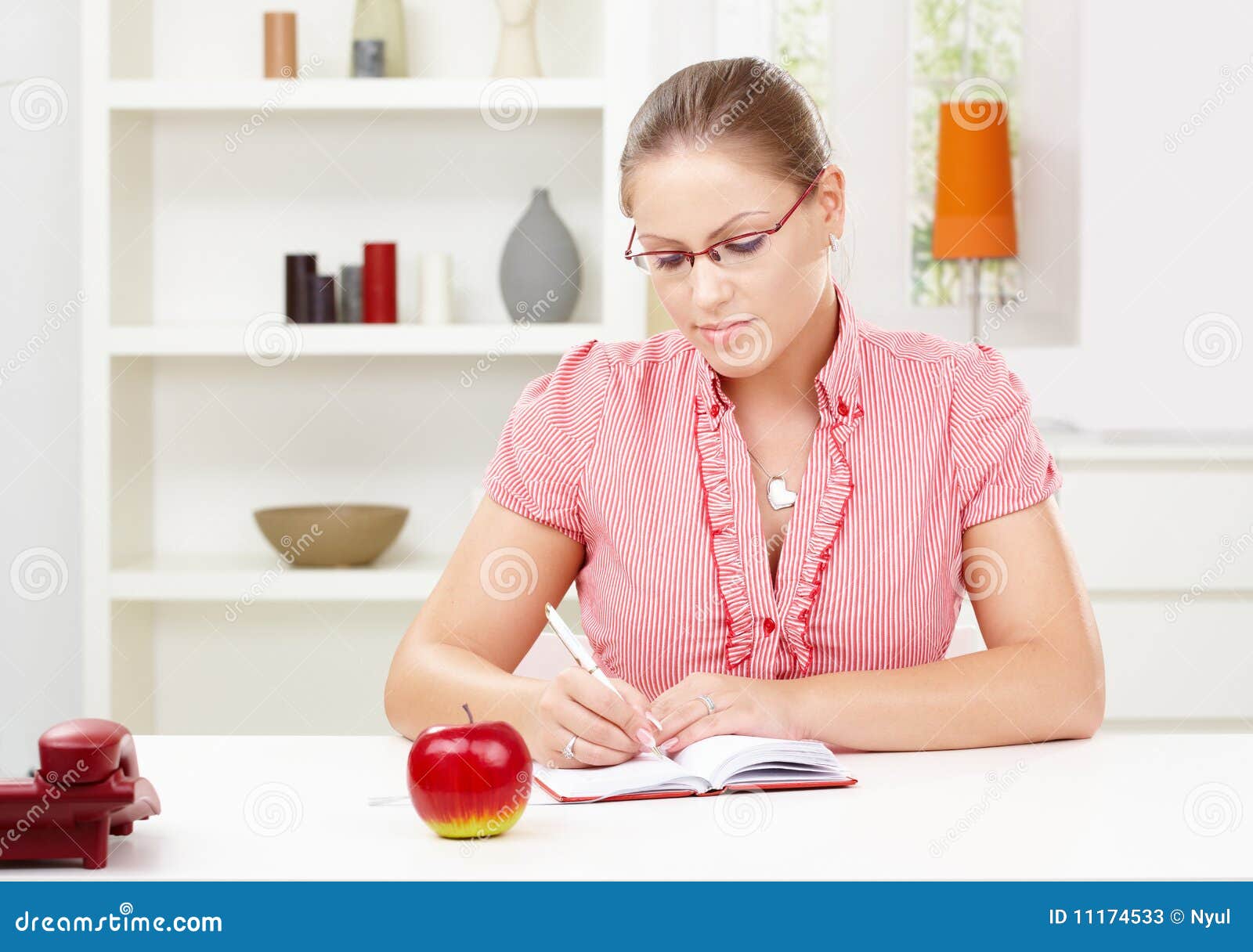 Young woman writing diary stock image. Image of interior - 11174533