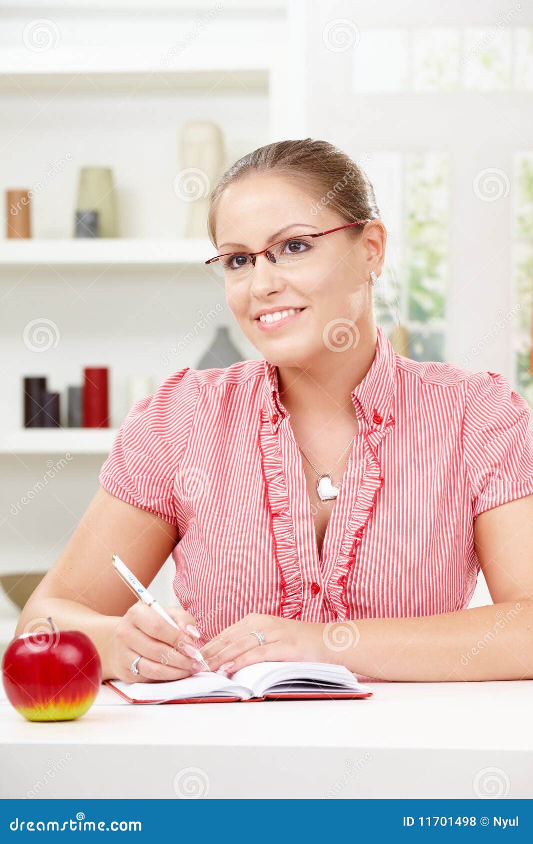 Young woman writing diary stock photo. Image of face - 11701498