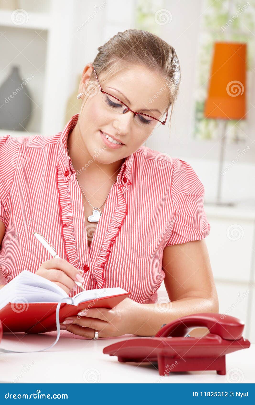 Young woman writing diary stock photo. Image of face - 11825312