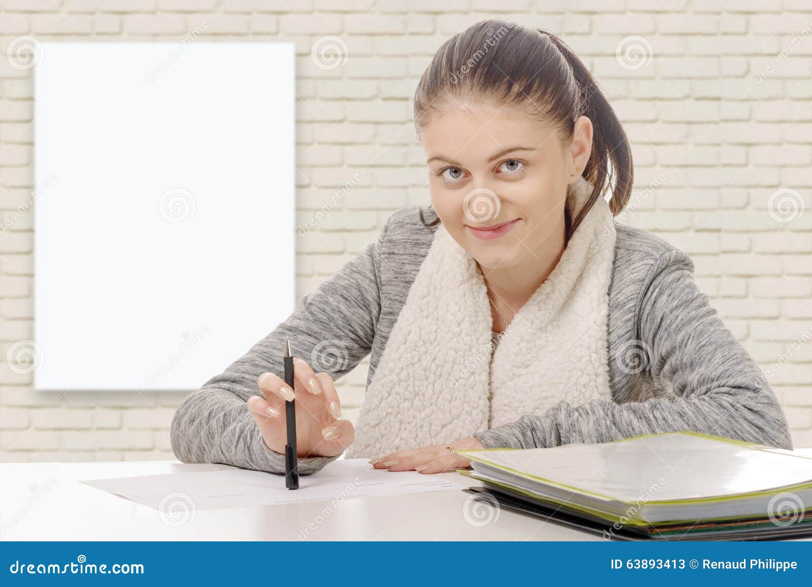 Young Woman Writing on Her Desk Stock Image - Image of desk, document ...