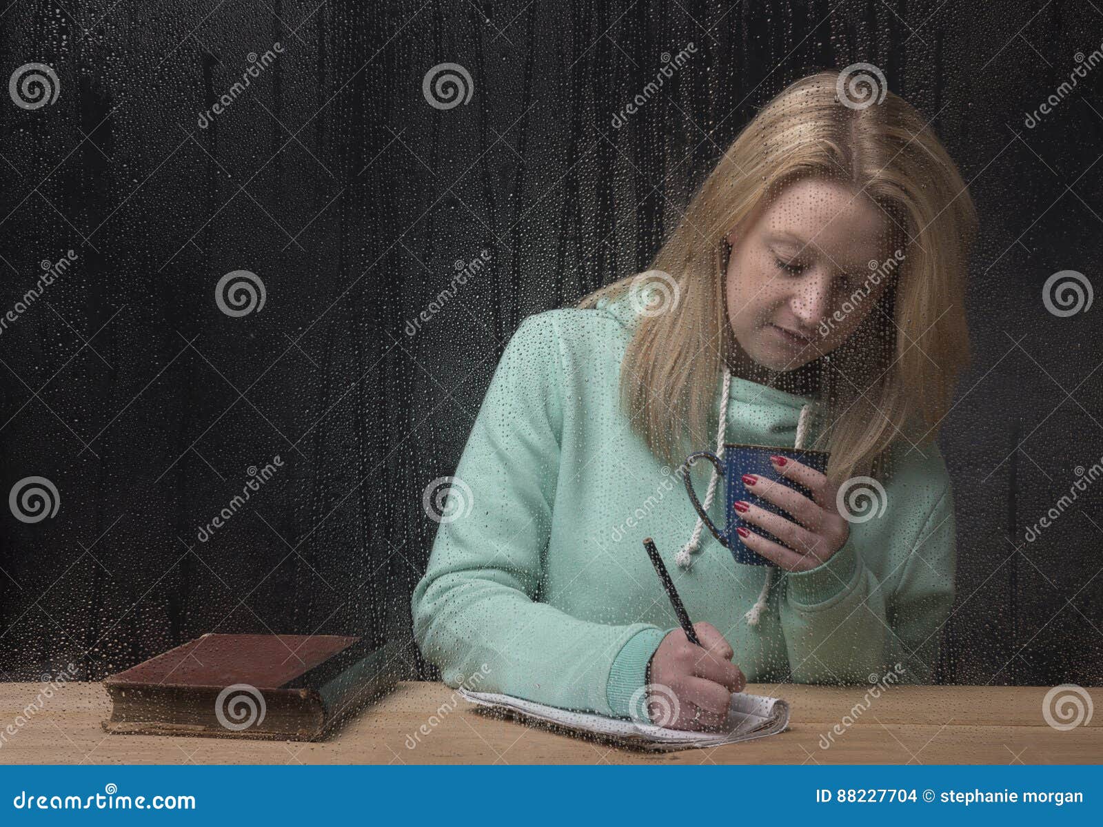 Young Woman Writing a Letter Stock Photo - Image of home, raining: 88227704