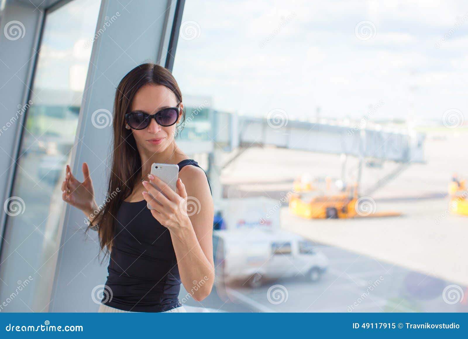 Young Woman Writing Message on Phone while Waiting Stock Image - Image ...