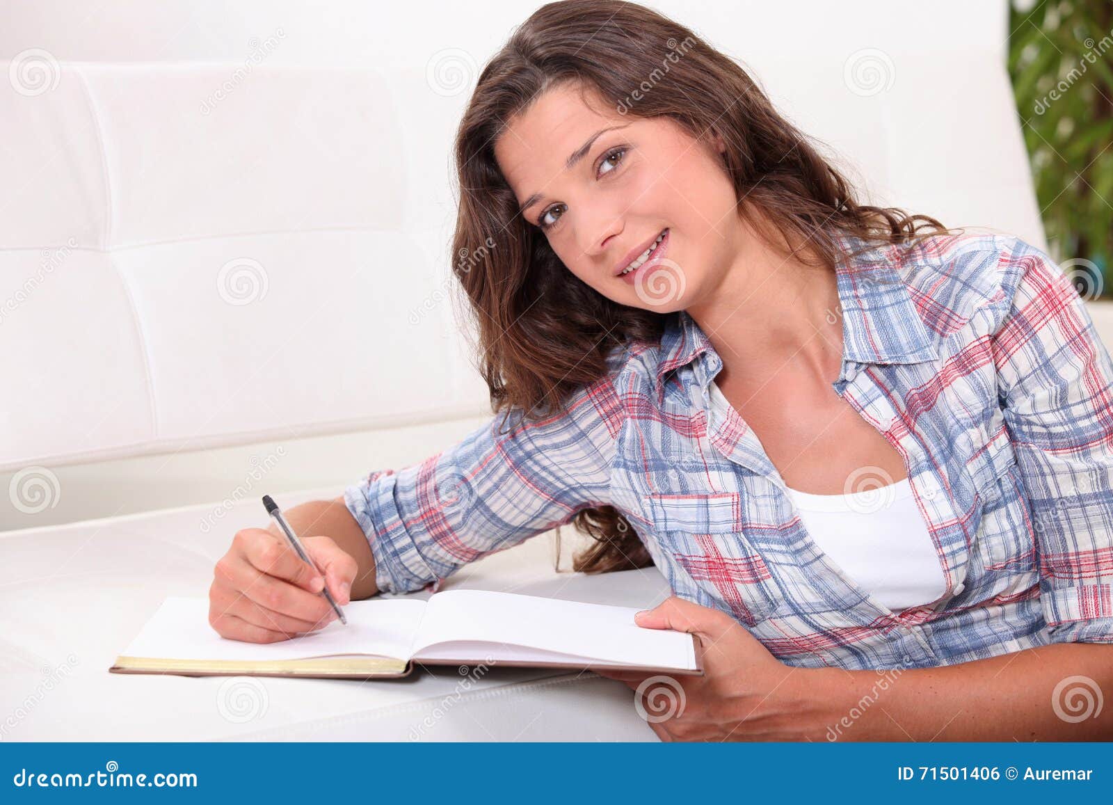 Young woman writing stock photo. Image of open, sofa - 71501406