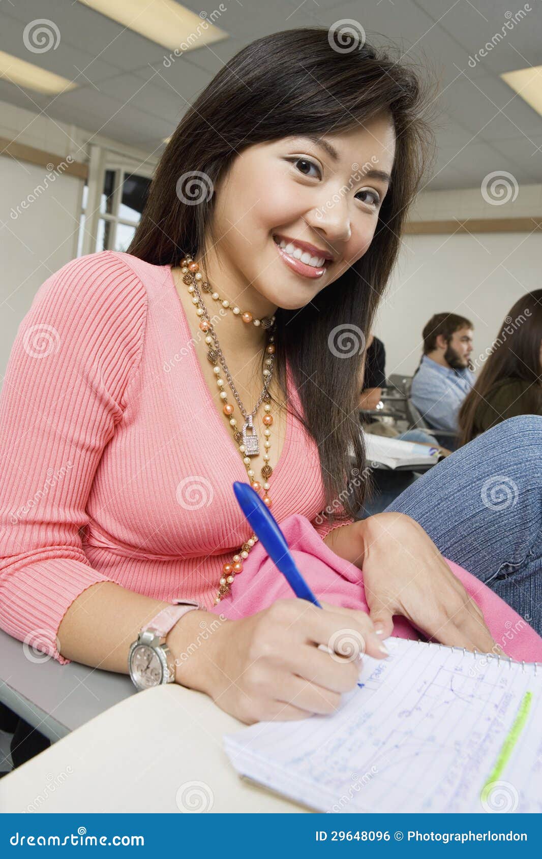 Young Woman Writing Notes stock photo. Image of paper - 29648096