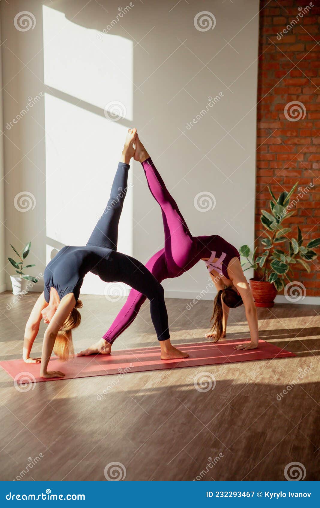 Young Womans Doing Beautiful Pair Asana Eka Pada Urdhva Dhanurasana In ... Young Womans Doing Beautiful Pair Asana Eka Pada Urdhva Dhanurasana In ...