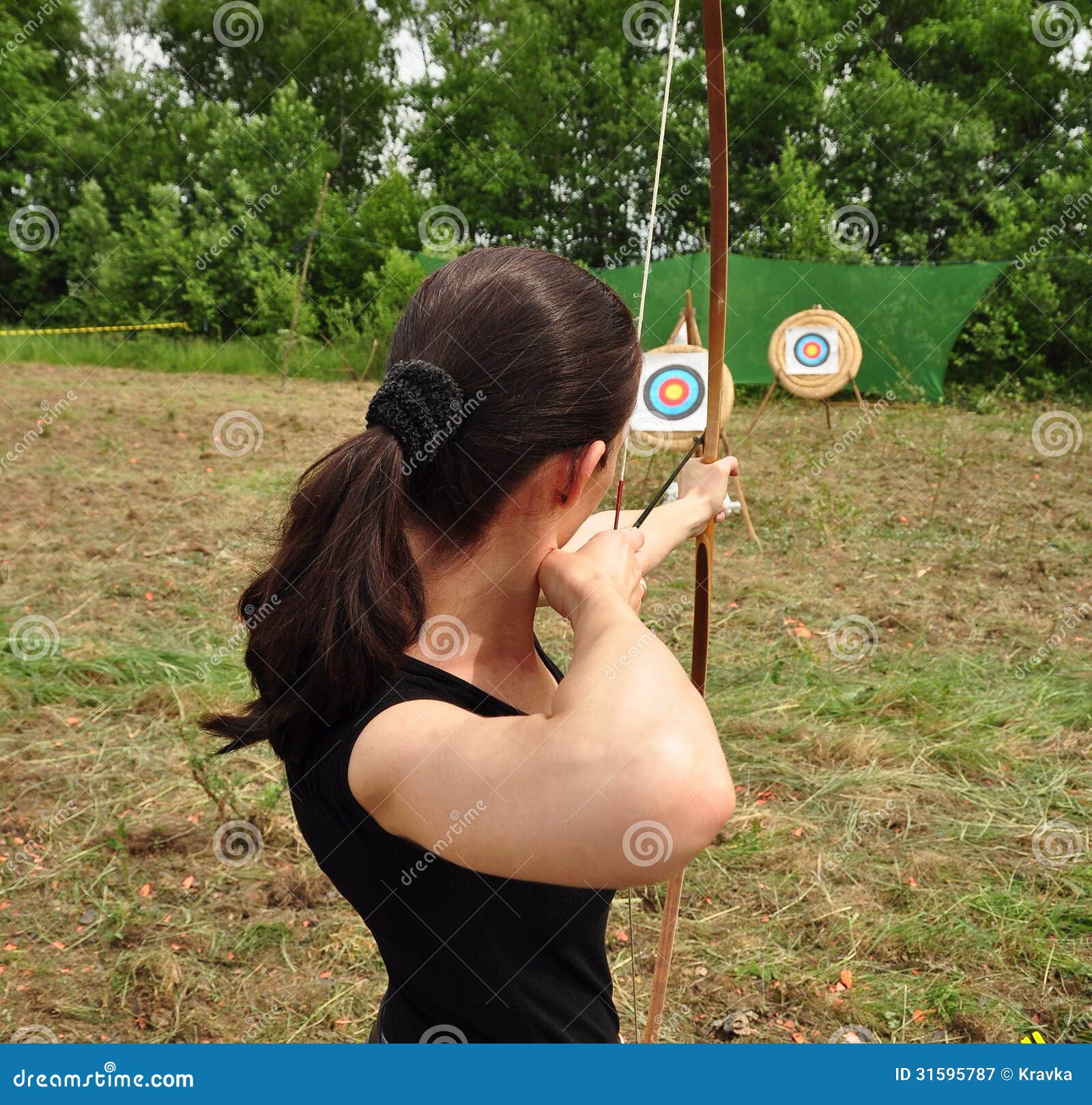 Young women with the bow stock image. Image of olympic - 31595787
