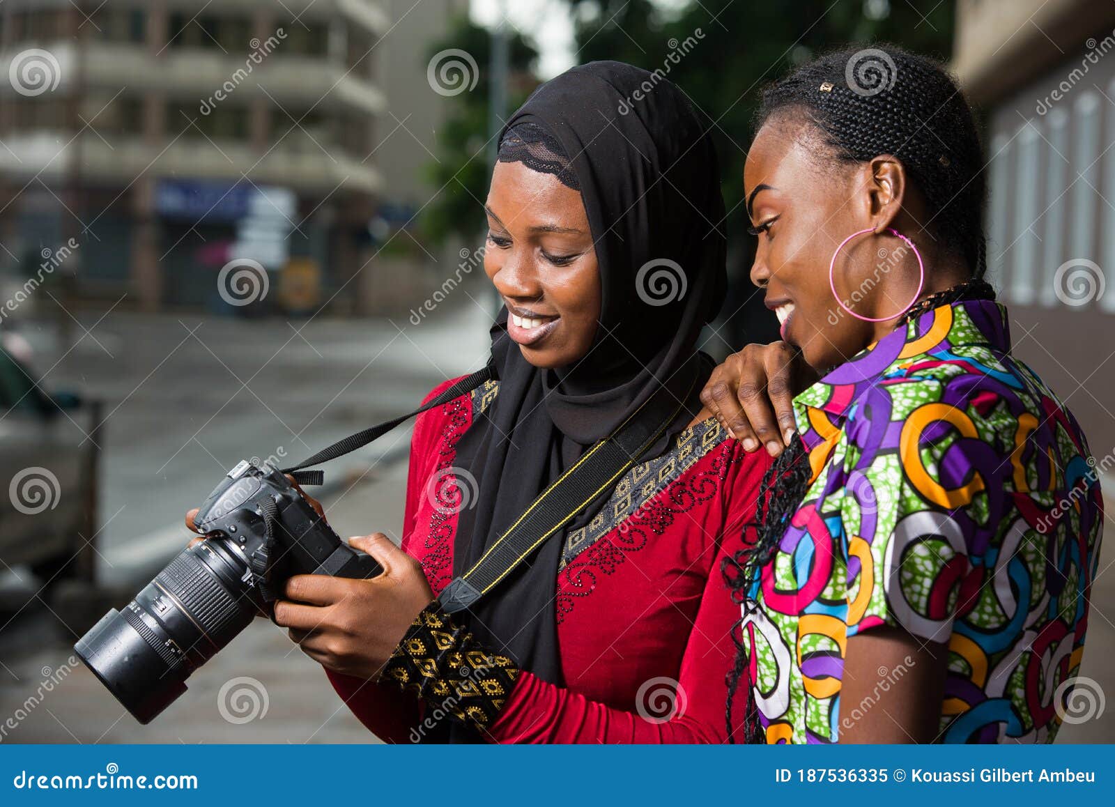 Young Women with Camera, Smiling Stock Image - Image of attractive ...