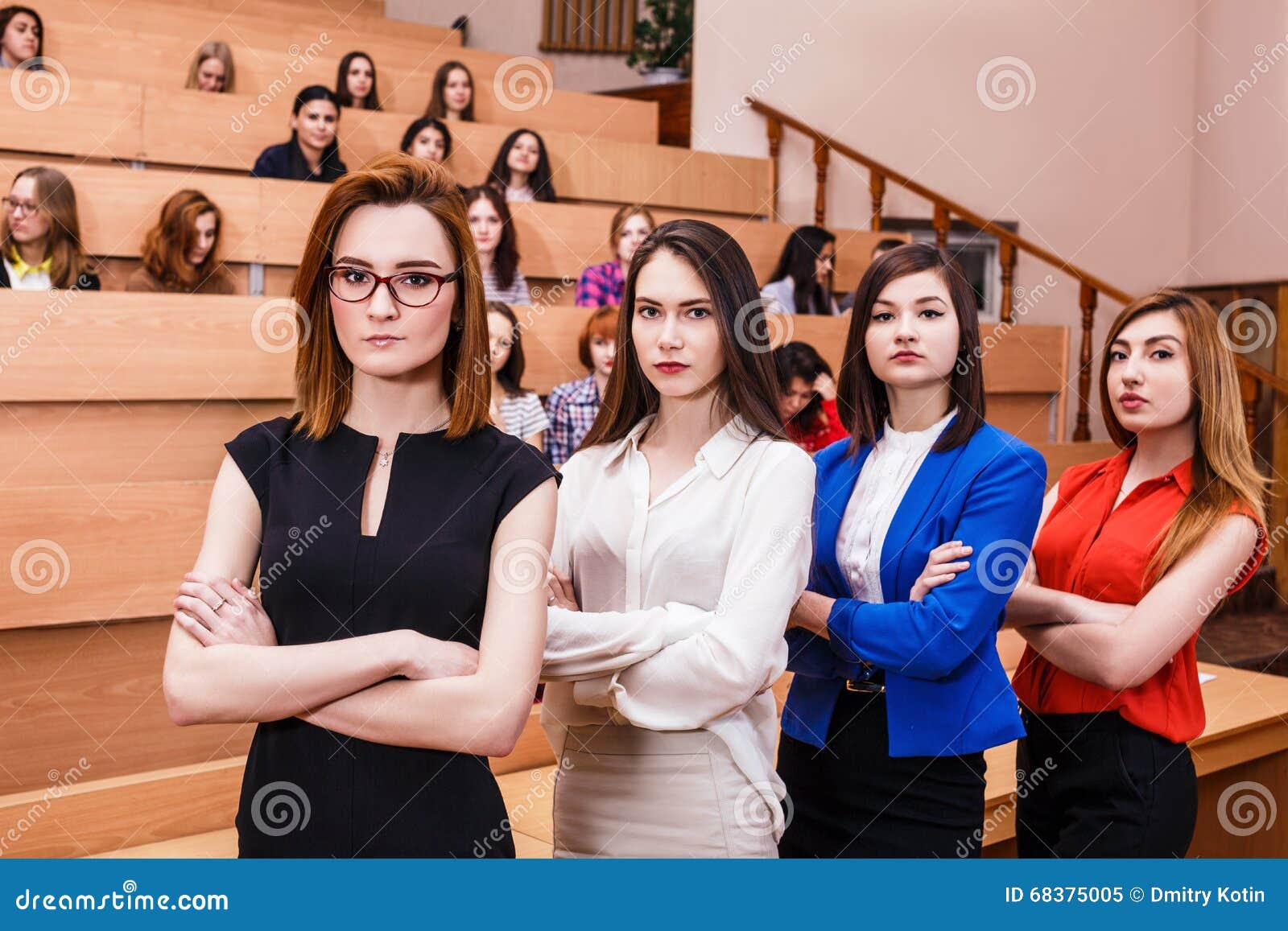 Young Women in Classroom with Students Stock Image - Image of beautiful ...