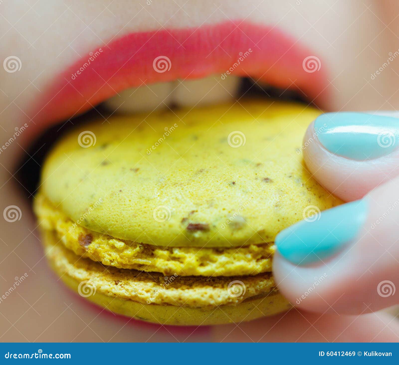 Young Women Eating Macaroon. Stock Image - Image of pretty, fingers ...