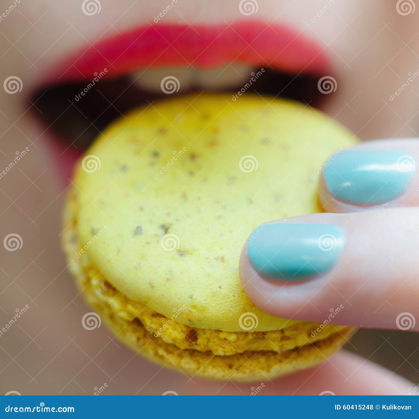 Young Women Eating Macaroon. Stock Photo - Image of young, french: 60415248