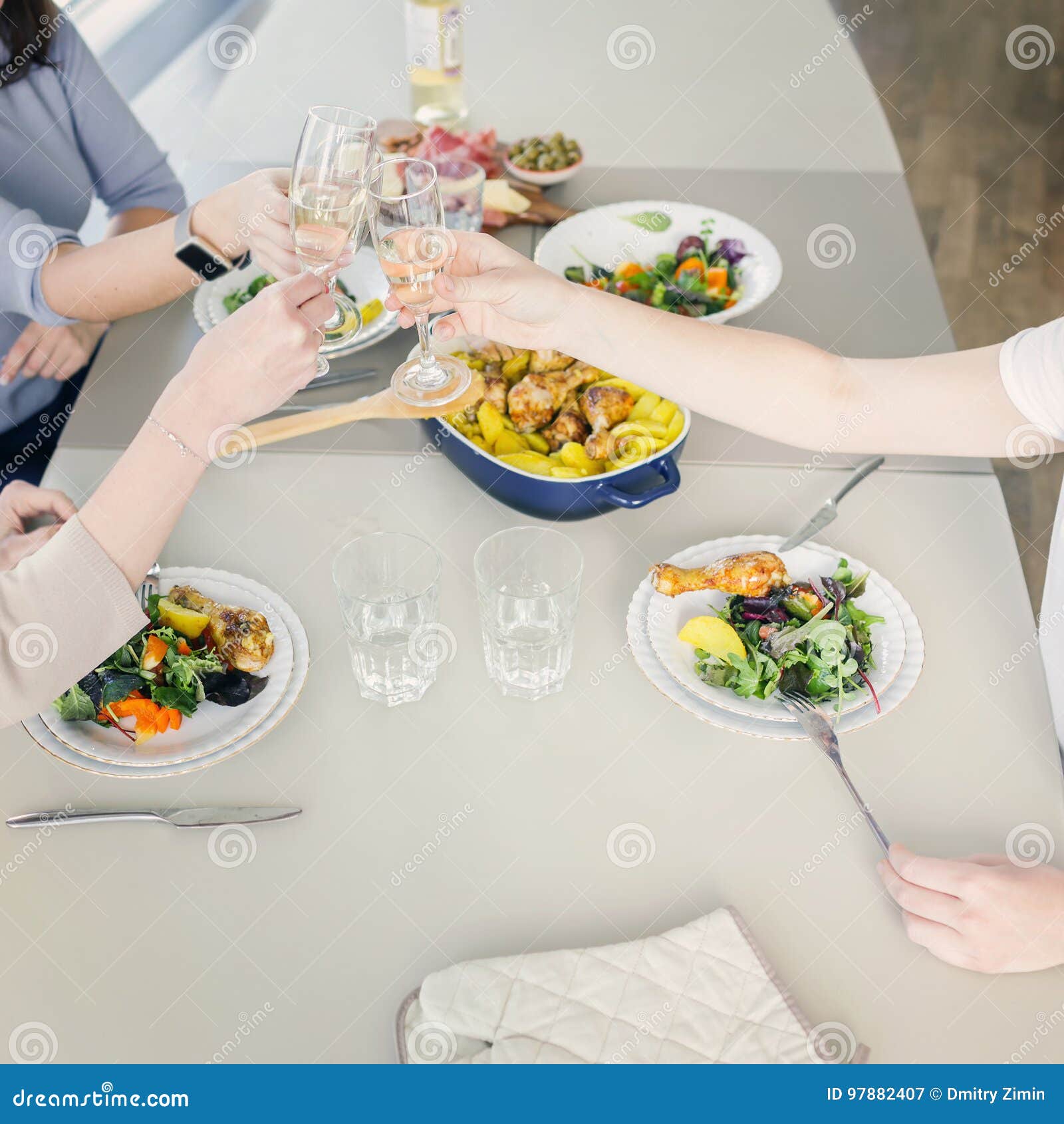 Young Women Enjoying Dinner with Champagne Stock Image - Image of ...