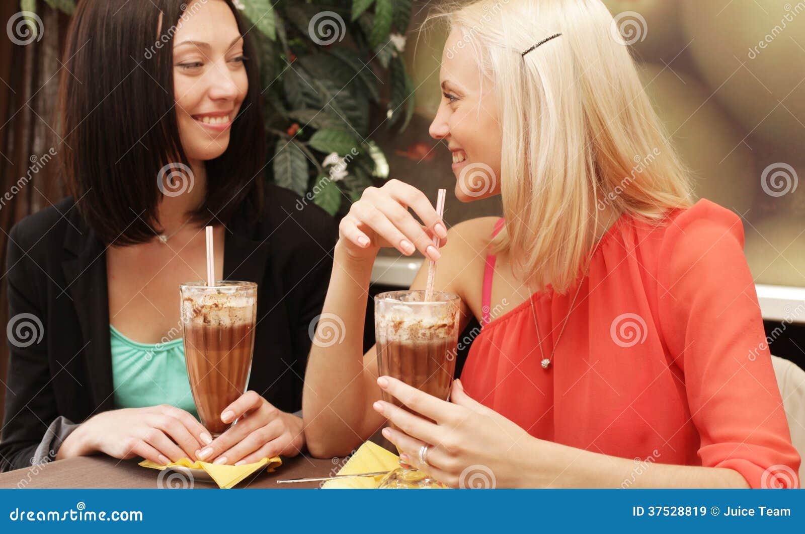 Young Women Having Coffee Break Together Stock Image - Image of ...