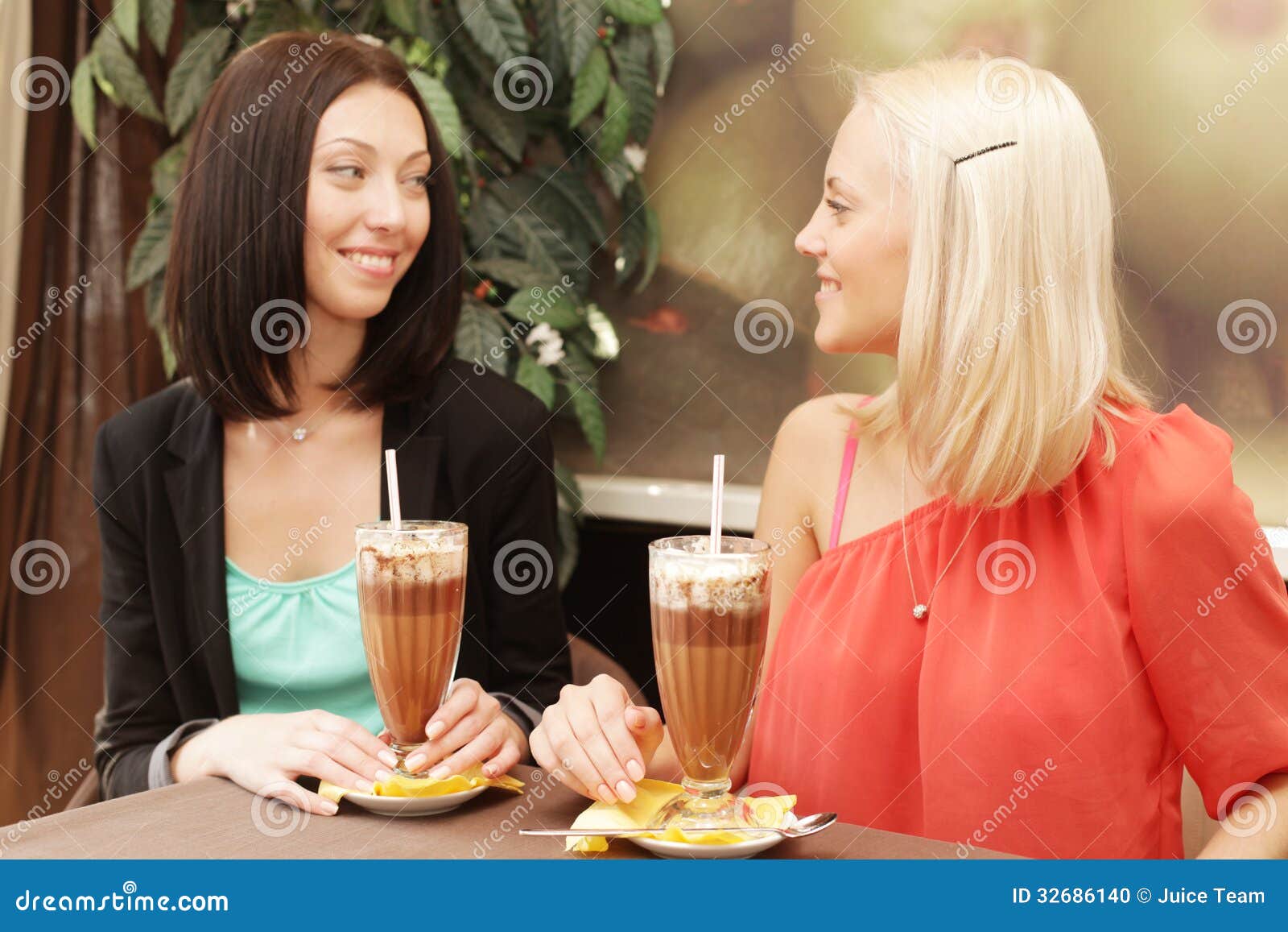 Young Women Having Coffee Break Together Stock Photo - Image of ...
