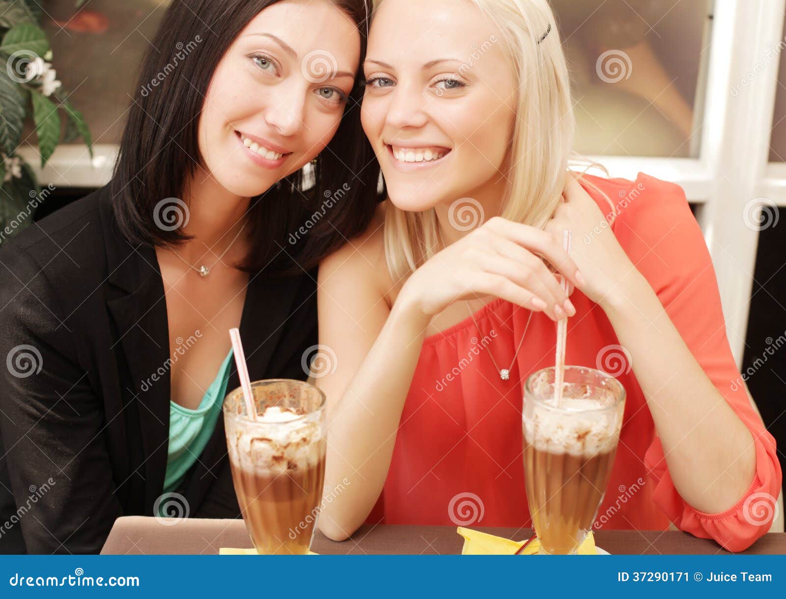 Young Women Having Coffee Break Together Stock Image - Image of ...