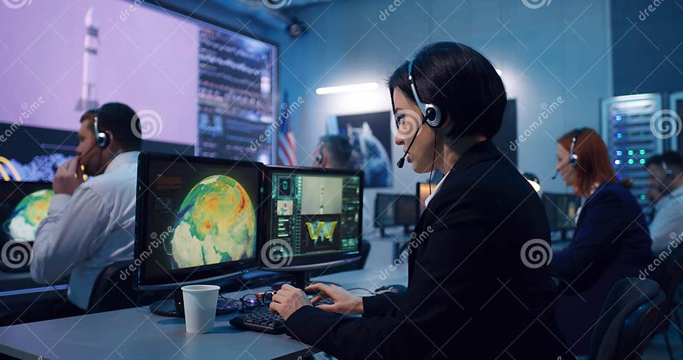 Flight Operator Using Computer during Spacecraft Launch Stock Photo ...