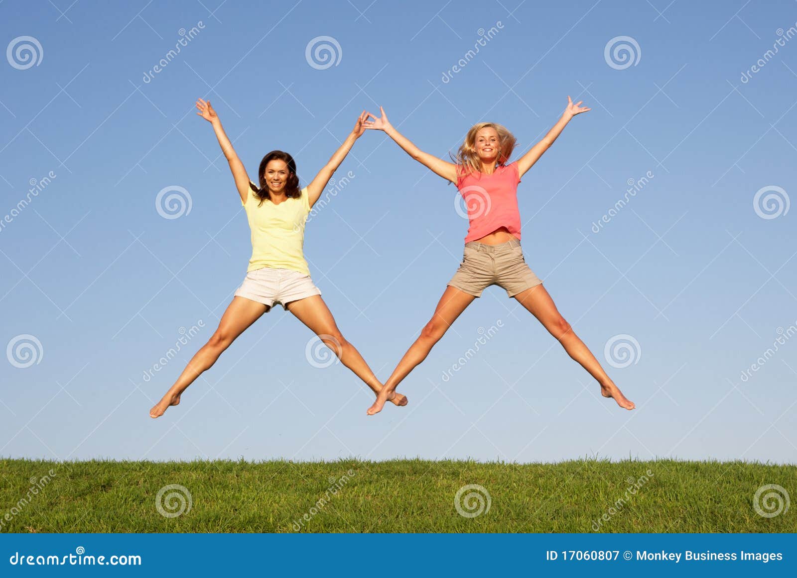 Young women jumping in air stock image. Image of exterior - 17060807