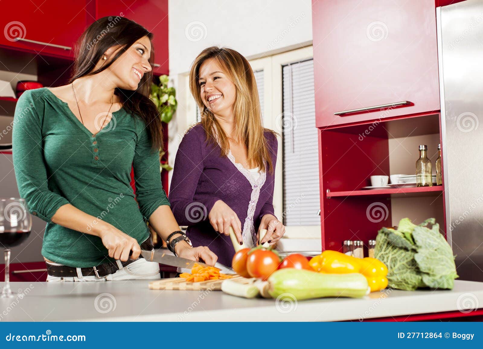 Young women in the kitchen stock photo. Image of modern - 27712864