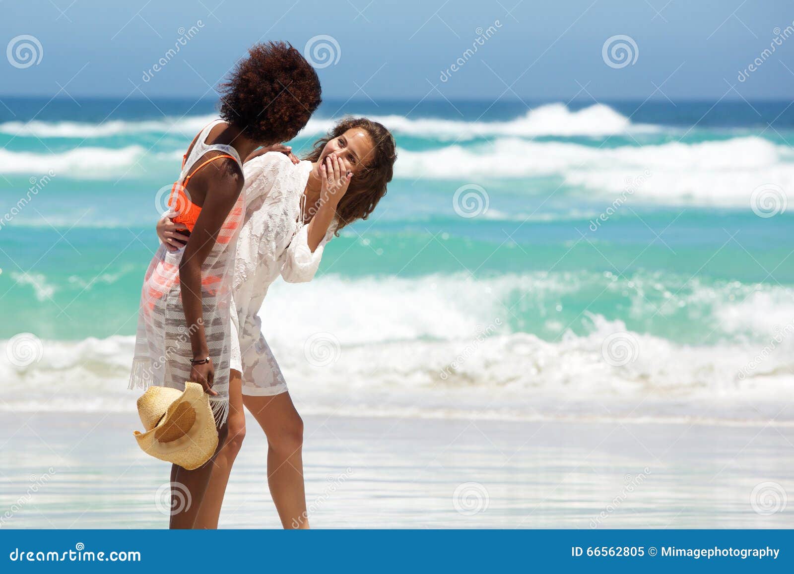 Young Women Laughing at the Beach Stock Image - Image of outdoors ...