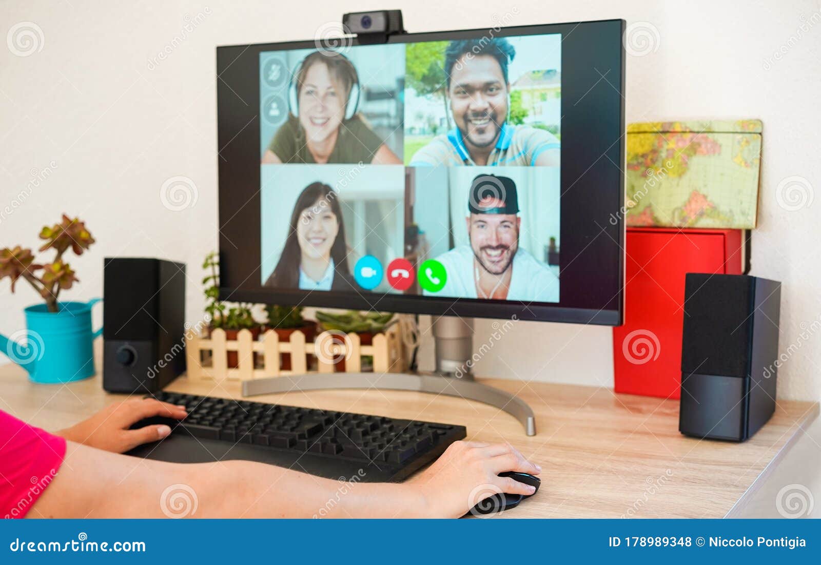 Young Woman Making a Video Call with Her Friends Using Computer Web ...