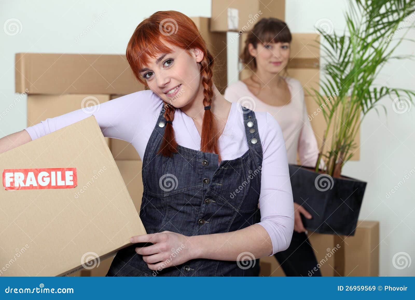 Young women moving stock image. Image of carrying, hair - 26959569