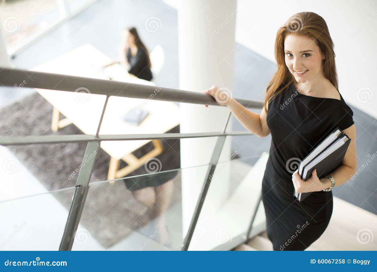 Young women in the office stock photo. Image of corporate - 60067258