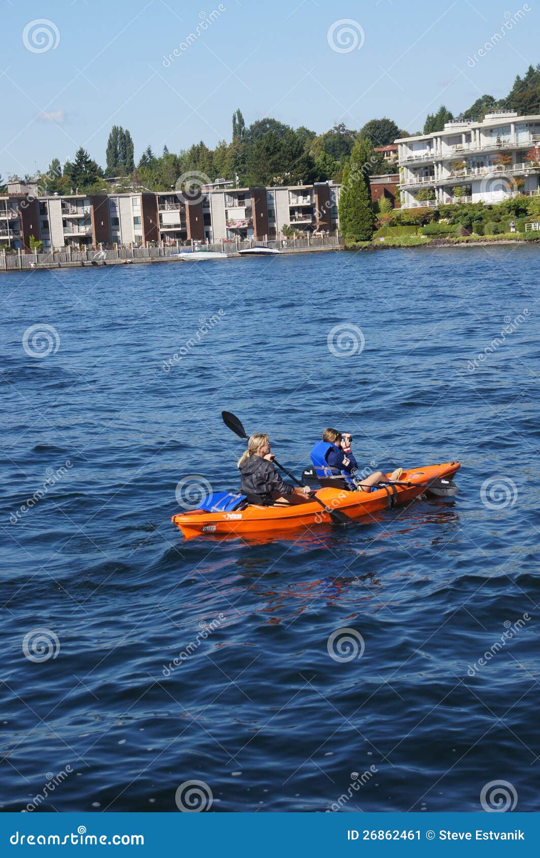 Young Women Paddle Their Kayak Editorial Photo - Image of waves, blue ...