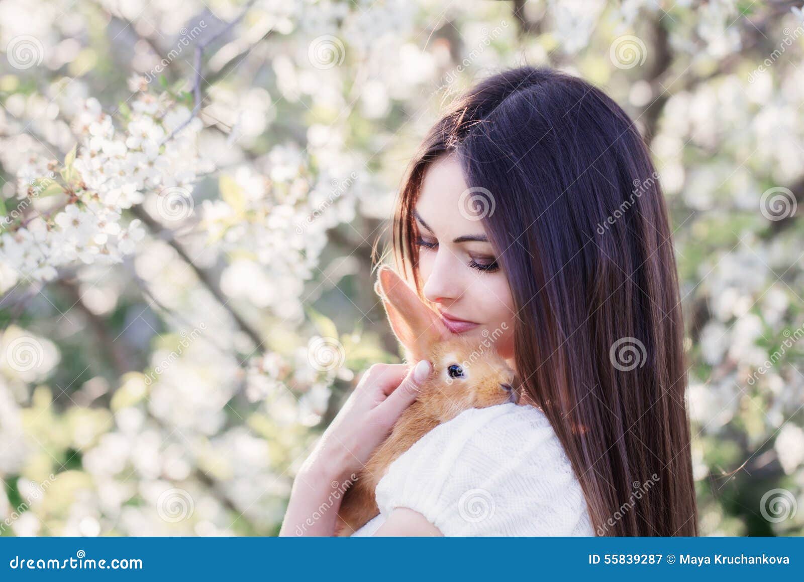 Young women with rabbit stock image. Image of holding - 55839287