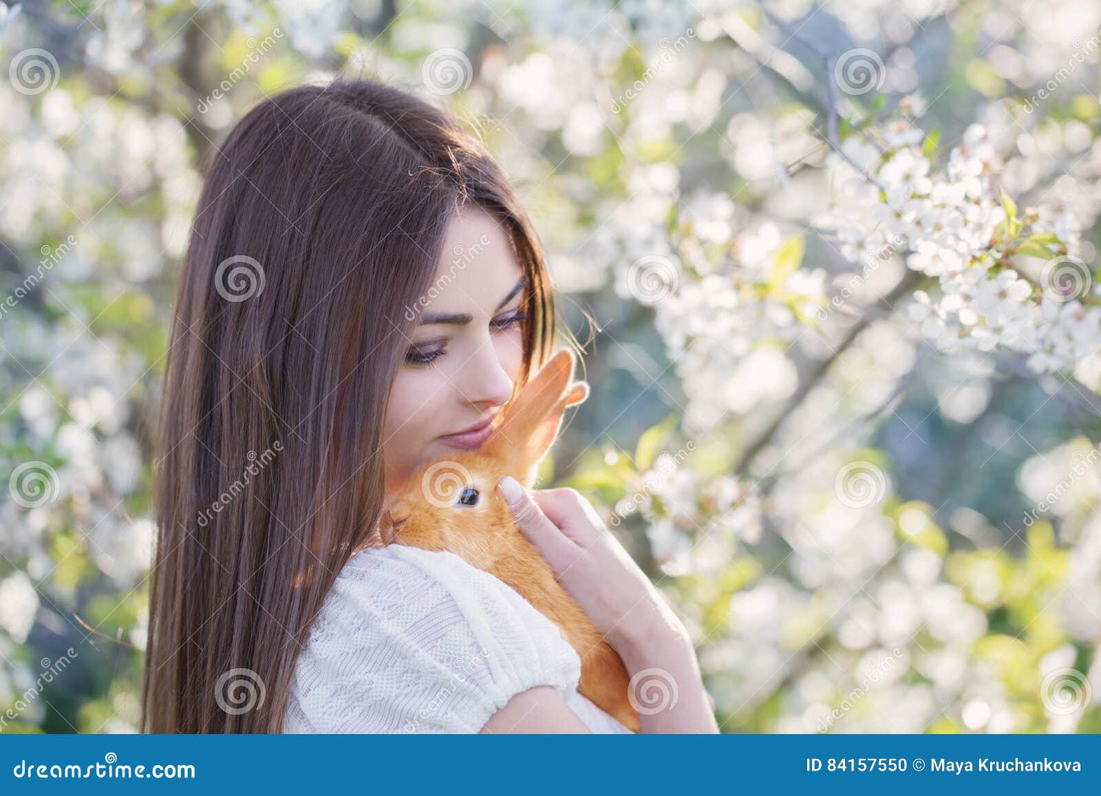 Young women with rabbit stock photo. Image of face, animal - 84157550