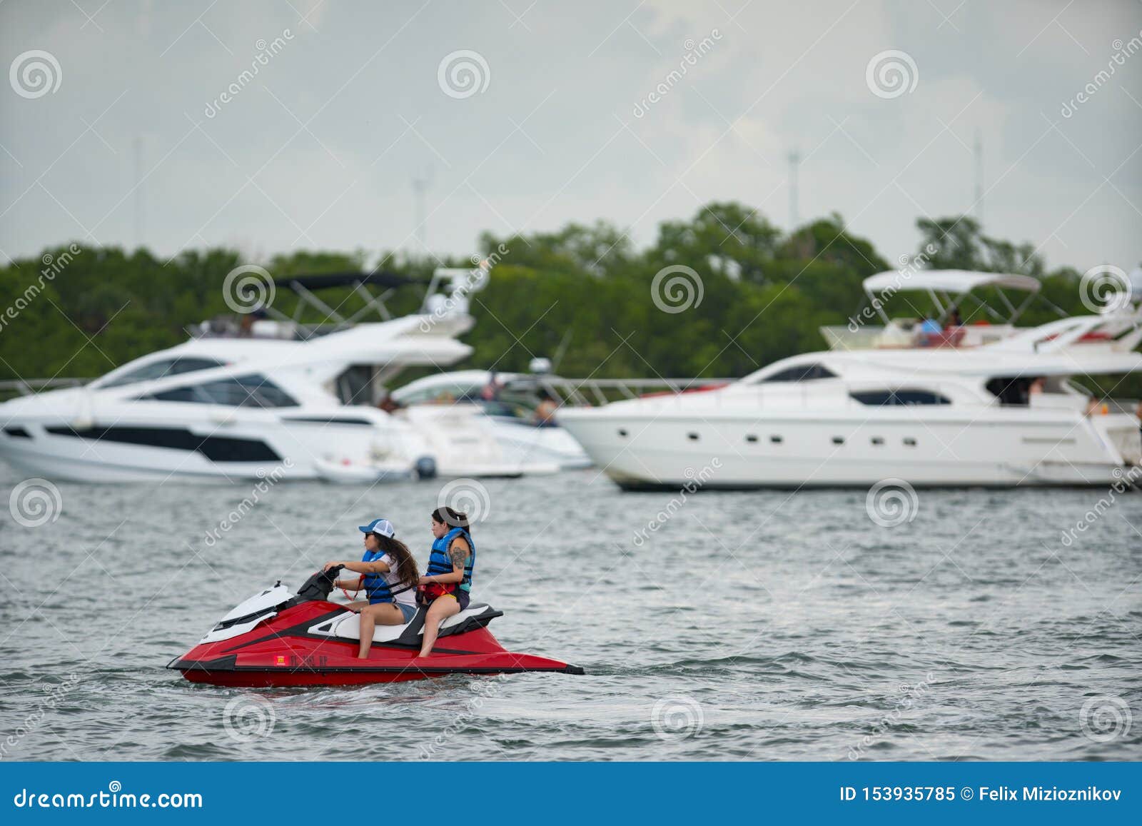 Young Women Riding a Wave Runner in Miami Beach Editorial Image - Image ...