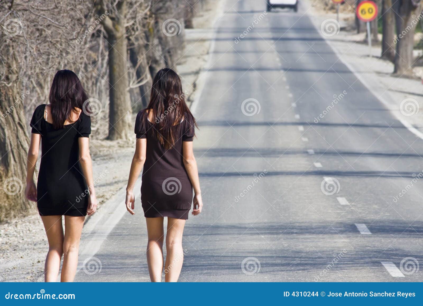 Young women in the road stock photo. Image of posing, bodies - 4310244