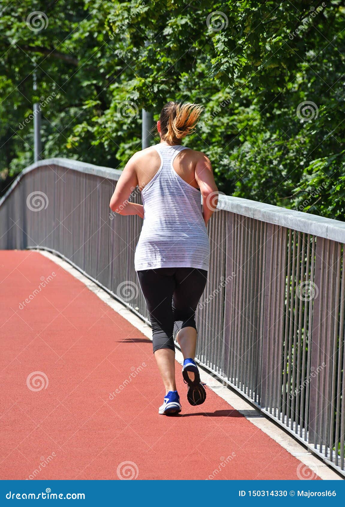 Young Women is Running on the Running Track Stock Photo - Image of ...
