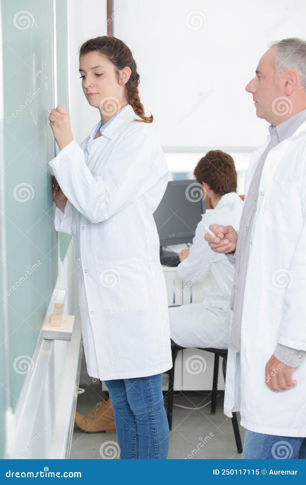 Young Women Scientist Writing on Green Board Stock Image - Image of ...