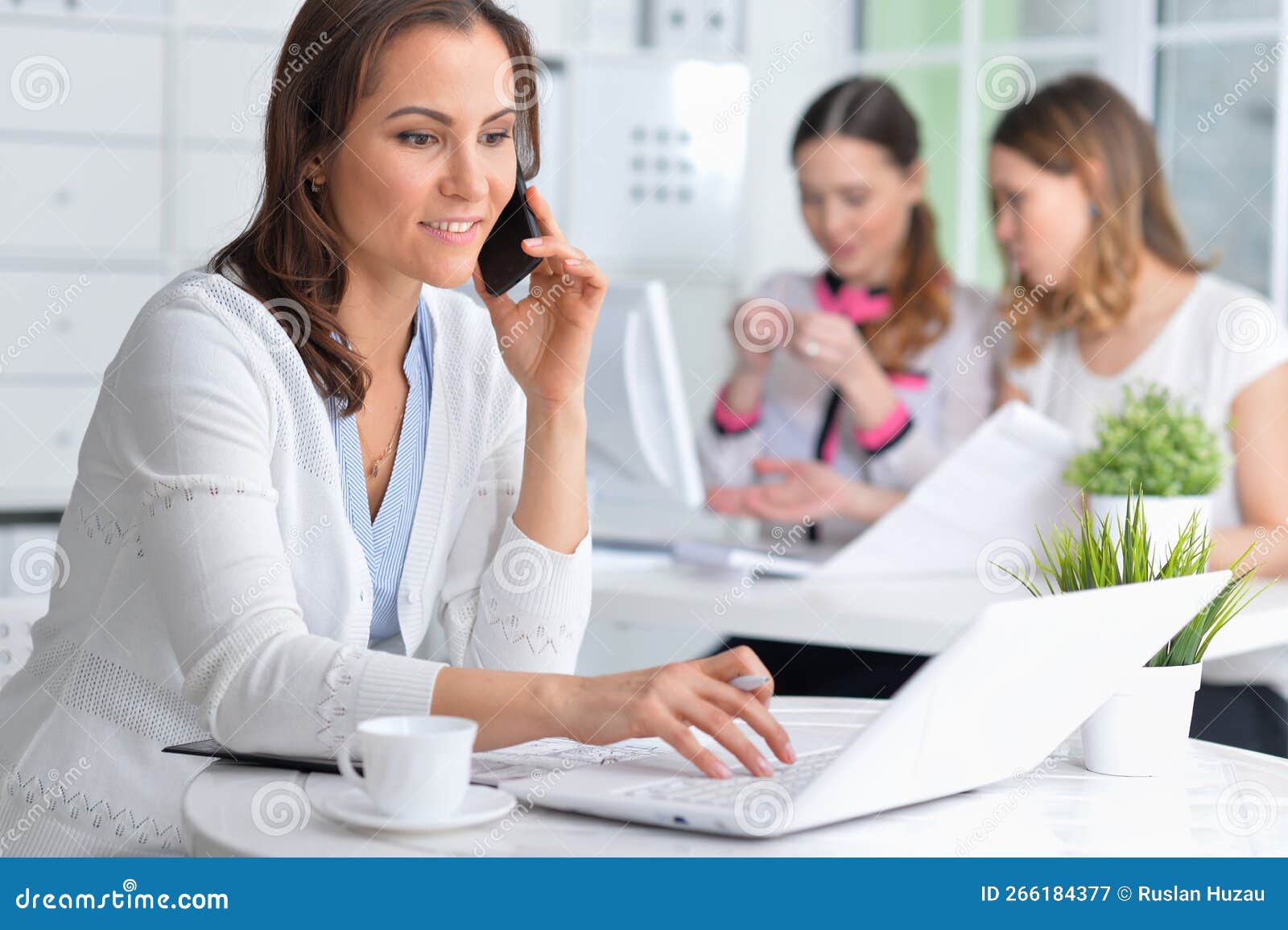 Young Women Sit at the Table and Work in a Modern Office Stock Image ...