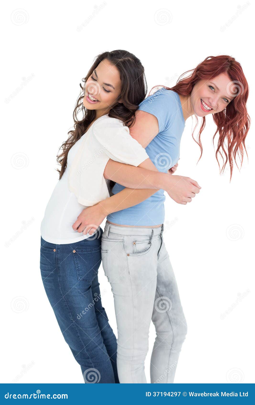 Young Women Standing Back To Back with Interlocked Hands Stock Image ...